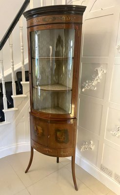 Antique bow front curio cabinet store