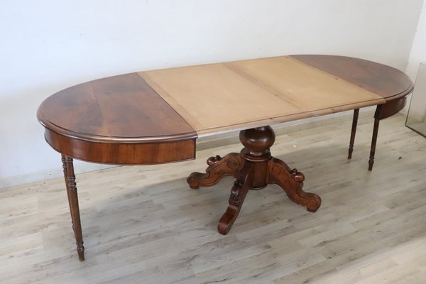 Antique extendable dining table store