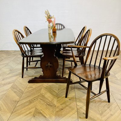Ercol round table and chairs store