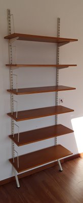 Mid Century Minimalist Bookcase with Adjustable Shelves in Yellow Brown Wood and Book Supports for White Painted Iron Frame from Sparrings