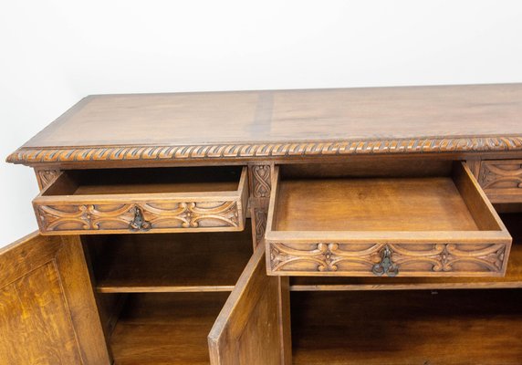 Spanish Oak and Hammered Wrought Iron Buffet with Fours Drawers and Doors 1960s for sale at Pamono