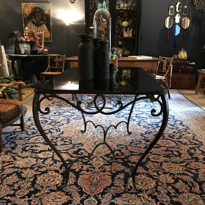 Wrought iron dining room table with glass top store