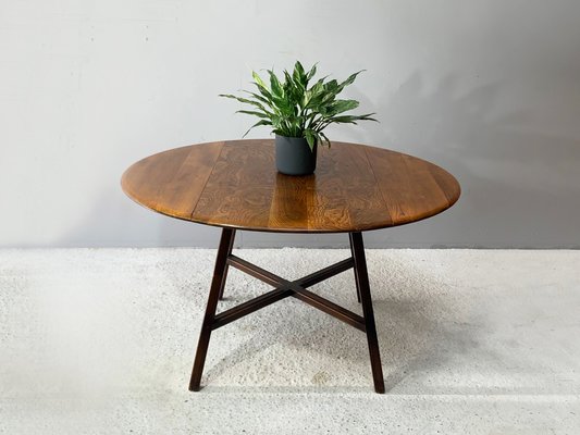 Ercol round drop leaf table store