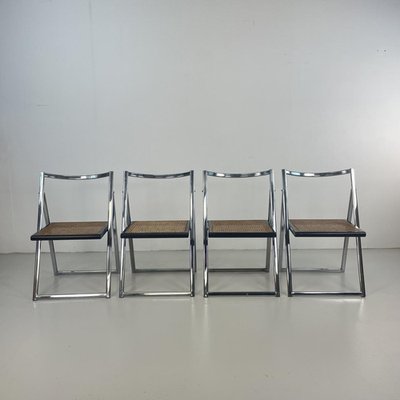 Cane and chrome chairs store