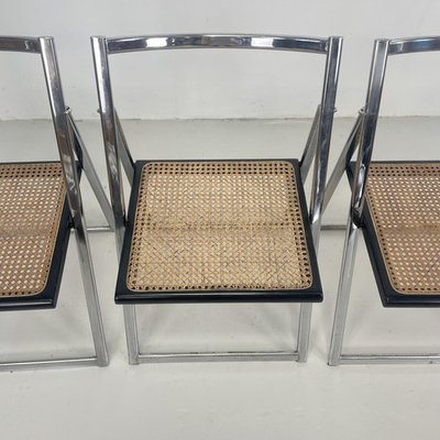 Chrome and cane chair store