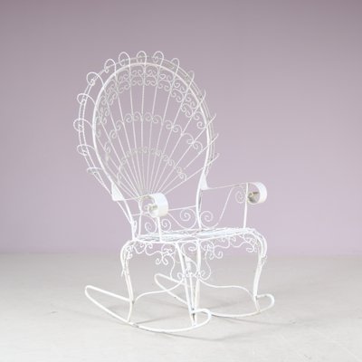 Vintage wrought iron rocking chair store