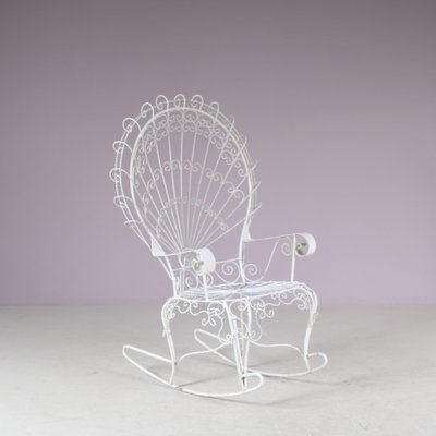 Peacock rocking chair store