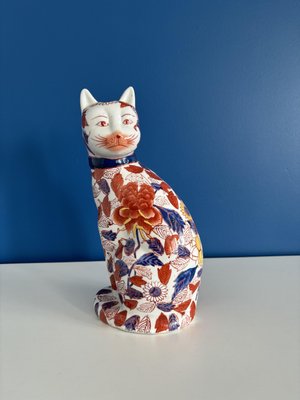 Porcelain cat statue store