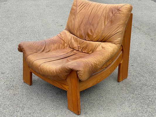 Distressed leather armchair store