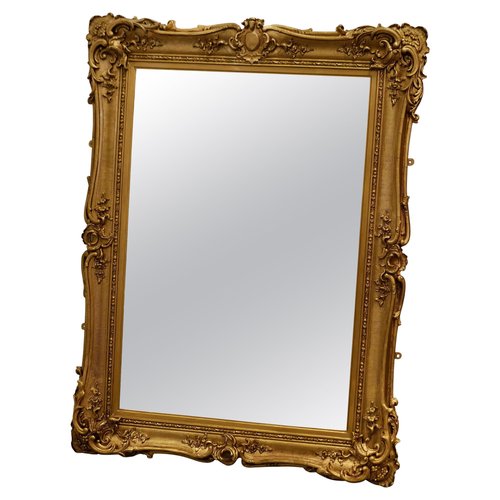 Espejo de pared rococó grande dorado, década de 1890 en venta en Pamono