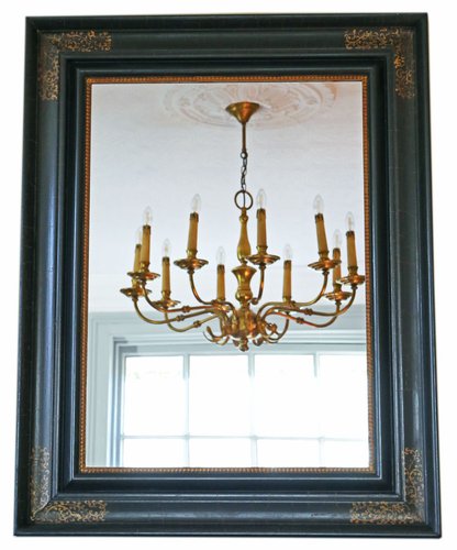 Espejo de pared de manto ebonizado y dorado, década de 1900 en venta en ...