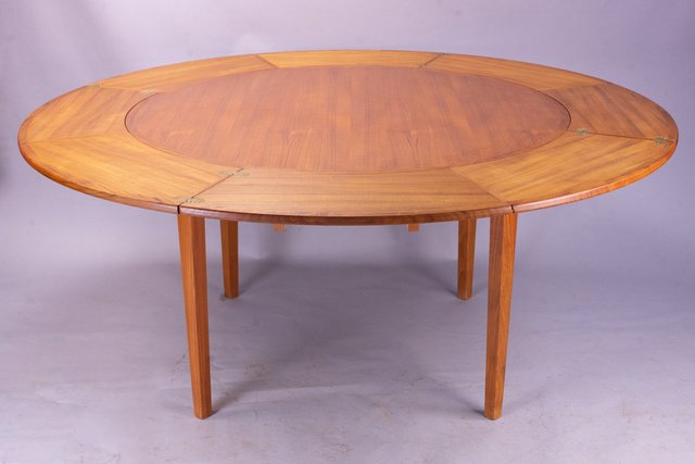 Mesa de comedor Lotus redonda extensible con solapa de teca de Dyrlund ...