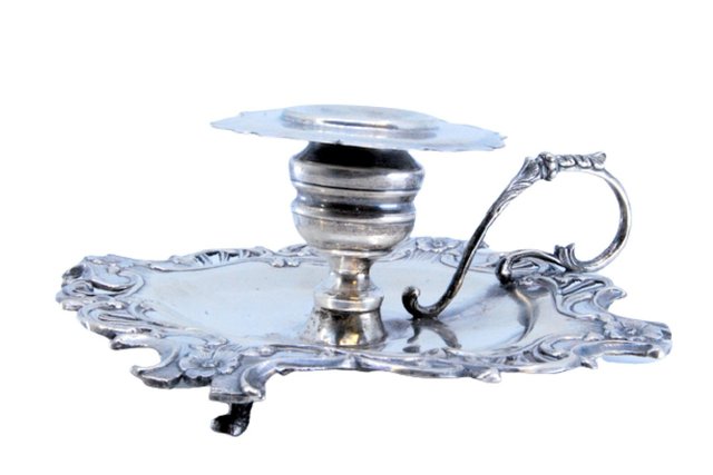 Silver Paddle with Embossed Flowers and Resting on Three Feet for sale ...