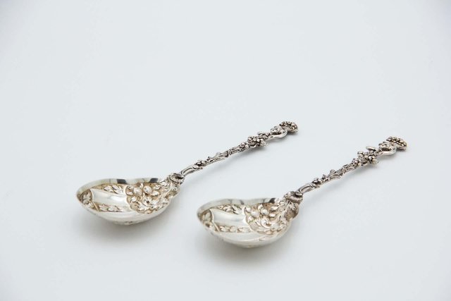 Souvenir Spoons in Silver with Embossed Putti Figures and Floral Motifs ...