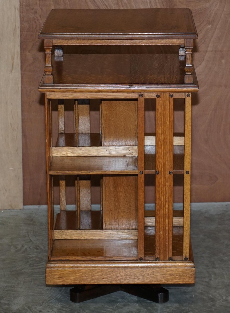 Art Nouveau Oak & Sample Wood Inlaid Revolving Bookcase for sale at Pamono