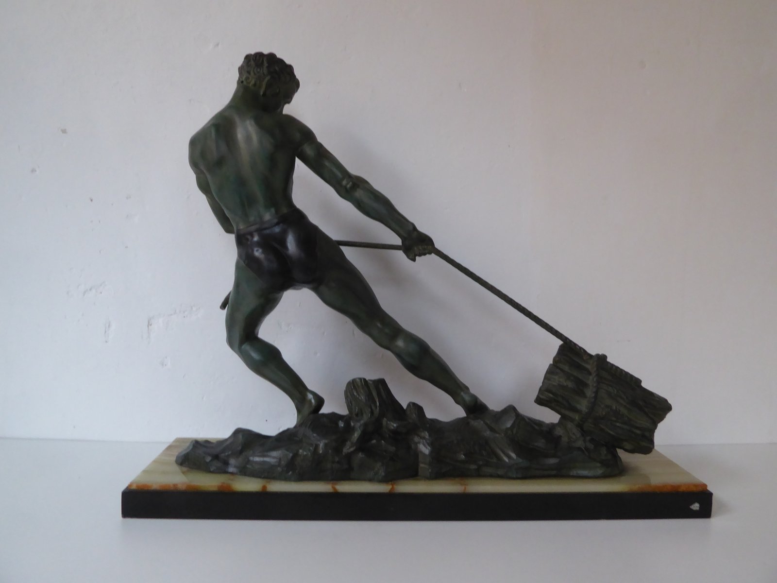 Art Deco Green Patinated Metal and Marble Sculpture of Man Pulling ...