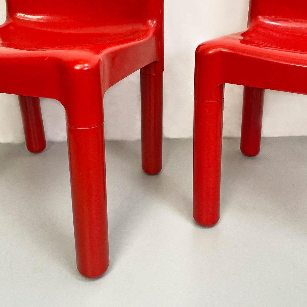 Rote italienische Space Age Stühle aus Kunststoff von Carlo Bartoli für Kartell, 1970er, 2er Set ...