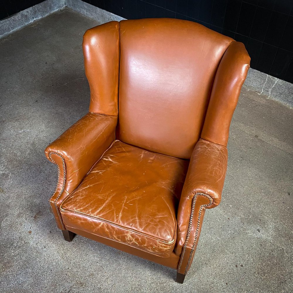 Vintage Cognac Leather Wingback Armchair for sale at Pamono