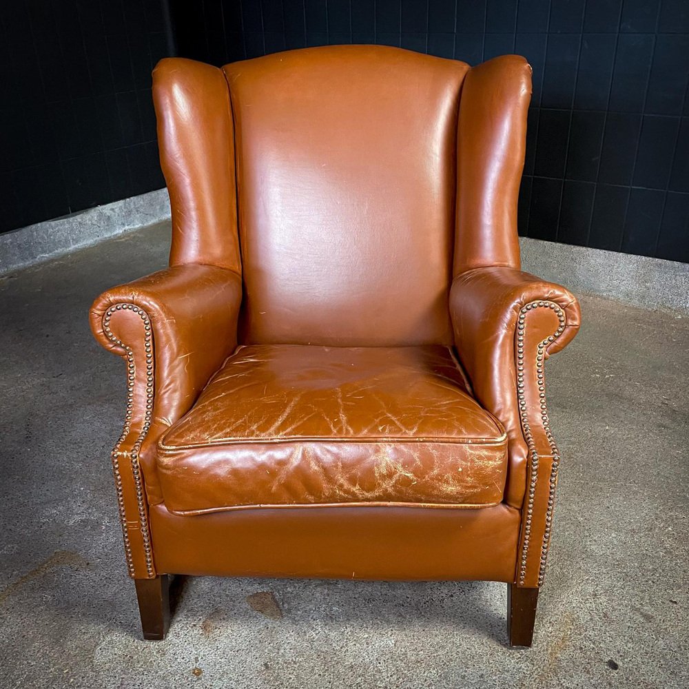 Cognacfarbener Vintage Ohrensessel aus Leder bei Pamono kaufen