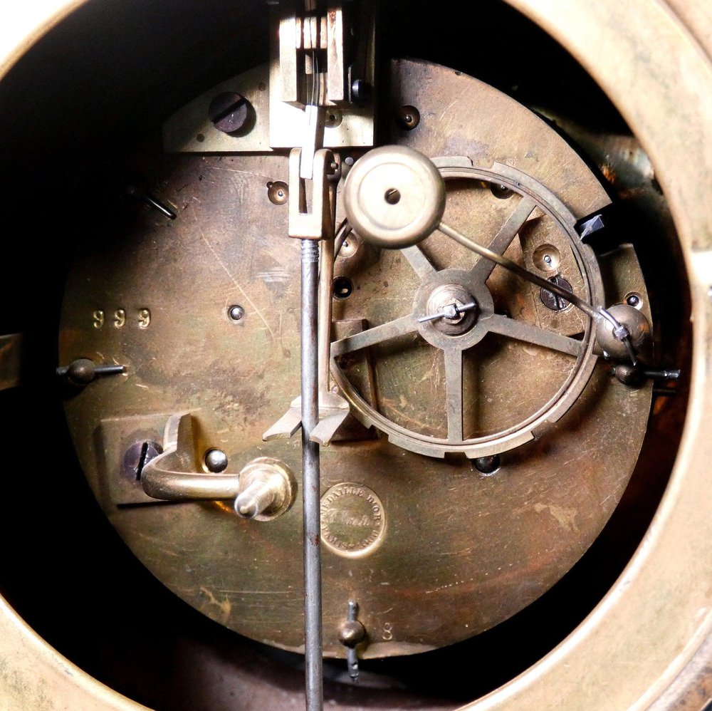 Marti Pendulum Clock with Bronze Sculpture for sale at Pamono