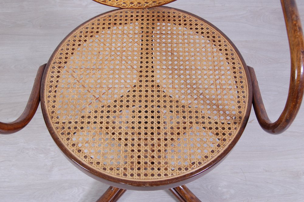 Swivel Wood and Straw Chair, Vienna, 1920s for sale at Pamono