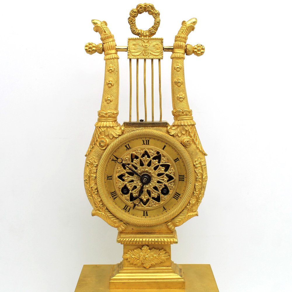 19th Century Empire Gilt Bronze Lira Pendulum Clock for sale at Pamono