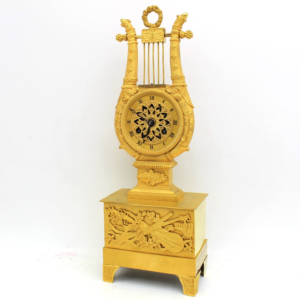 19th Century Empire Gilt Bronze Lira Pendulum Clock for sale at Pamono