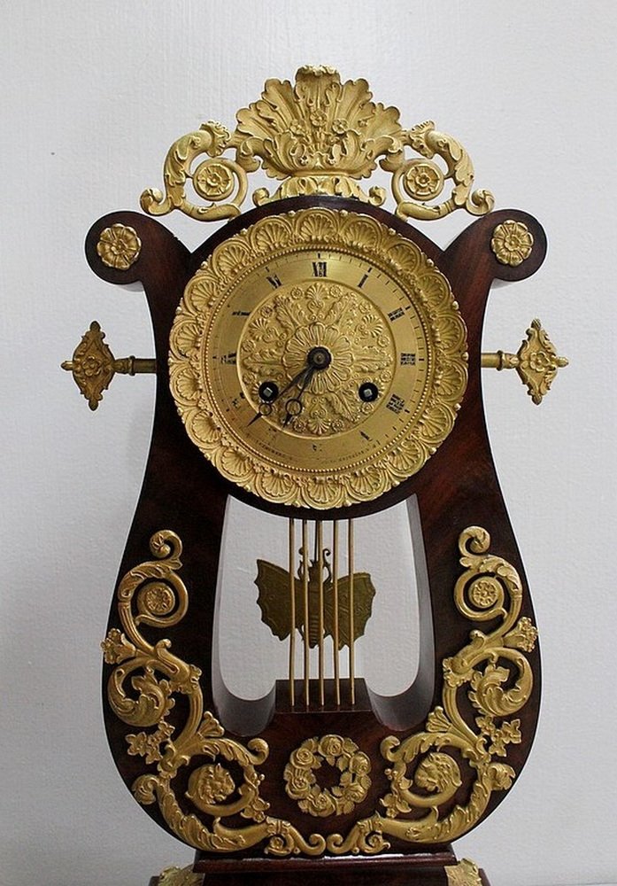 Empire Lyre Pendulum in Mahogany and Gilded Bronze for sale at Pamono