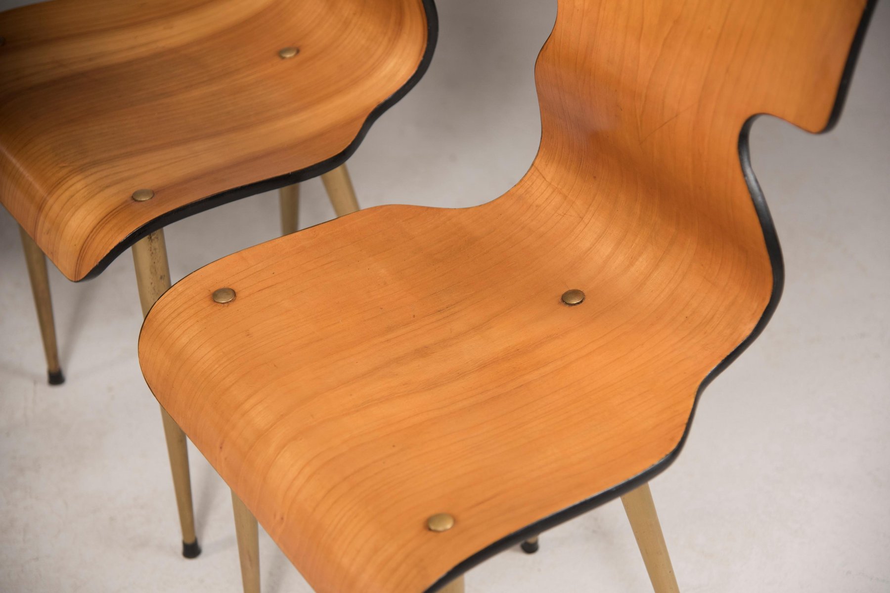 Mid-Century Black Lined Chairs in Brass, 1950s, Set of 4 for sale at Pamono