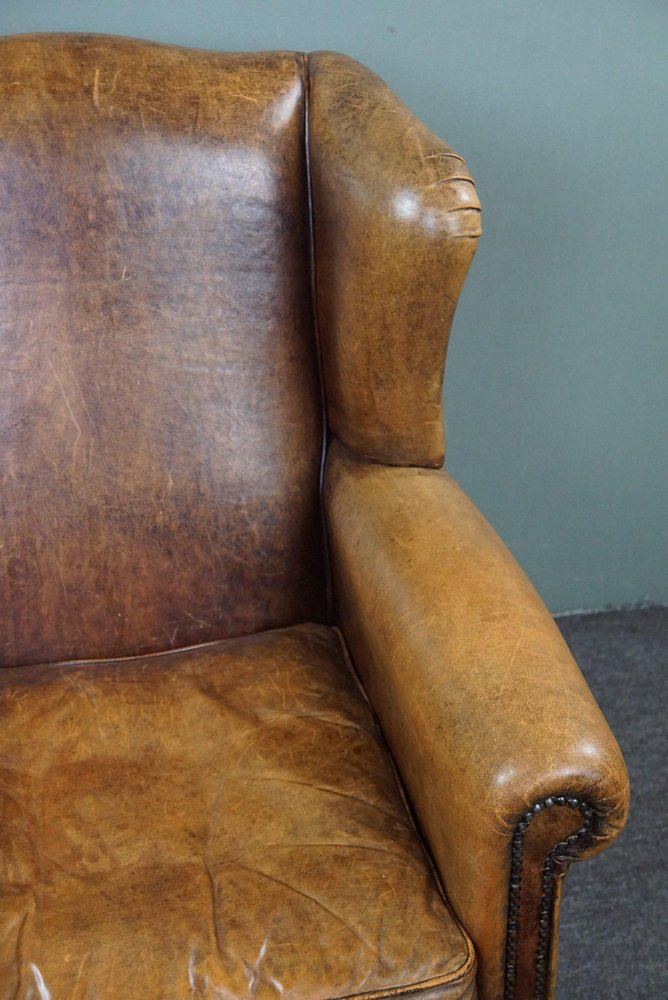 Sheep leather Lounge Chair with Decorative Rivets for sale at Pamono