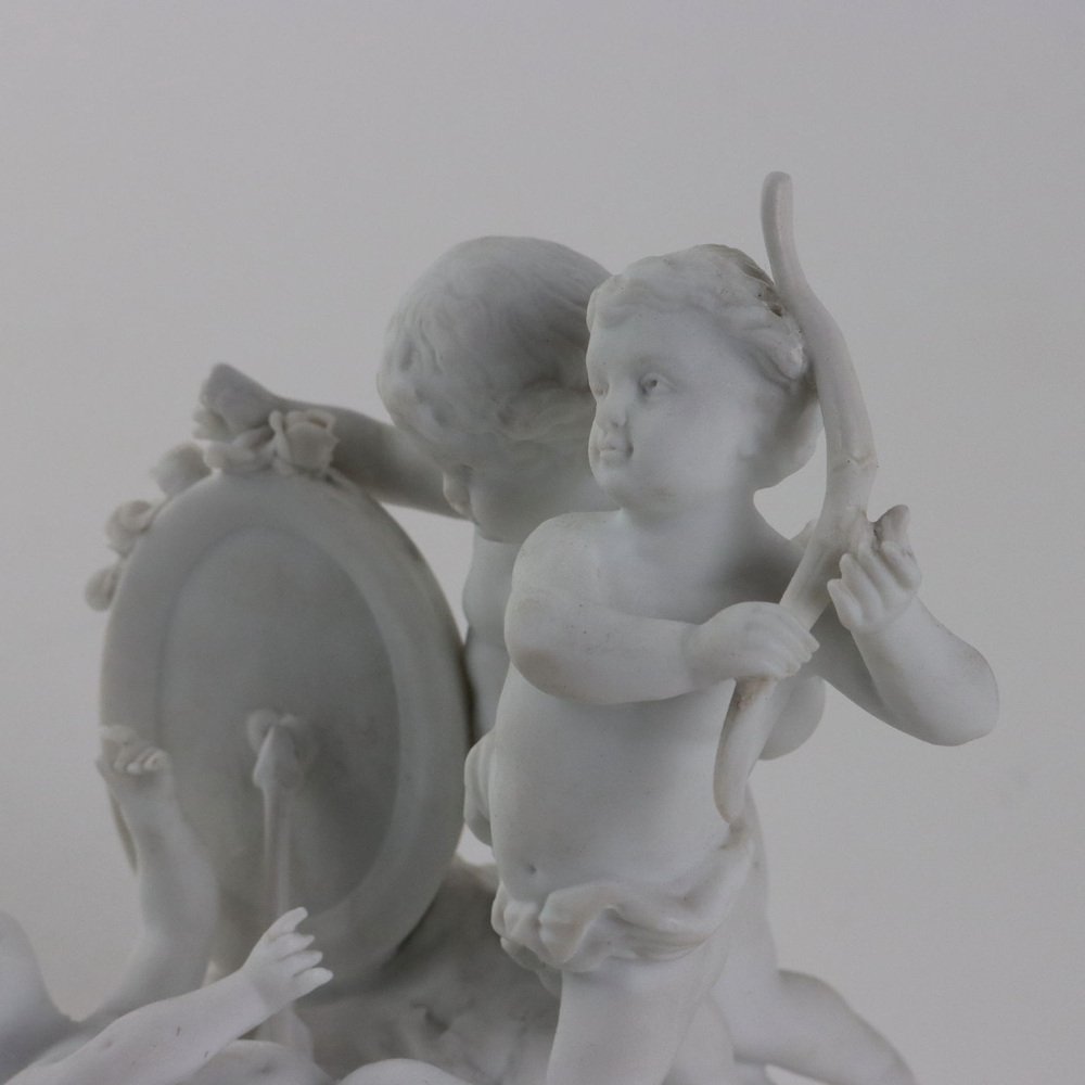 Vintage Porcelain Cupid Figurine for sale at Pamono