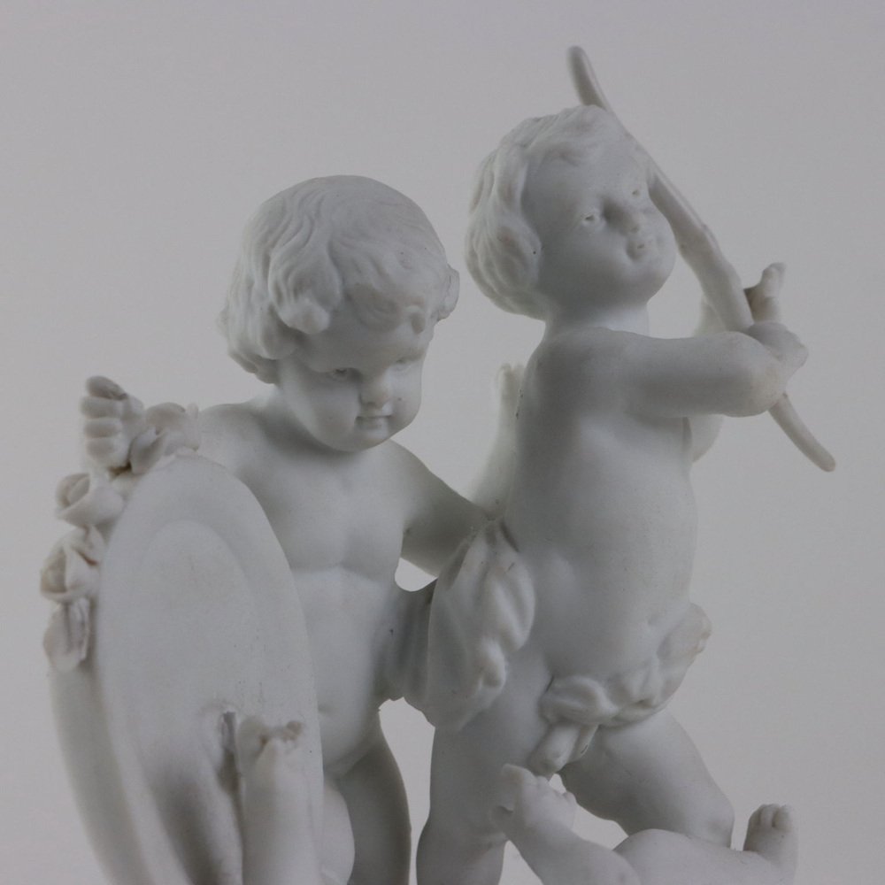Vintage Porcelain Cupid Figurine for sale at Pamono