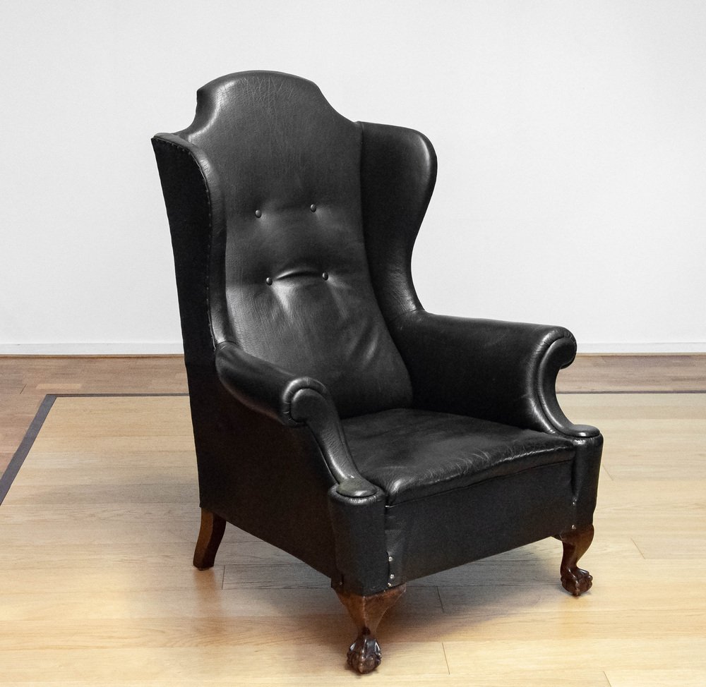 19th Century Black Leather Chippendale Wingback Chair with Claw and ...