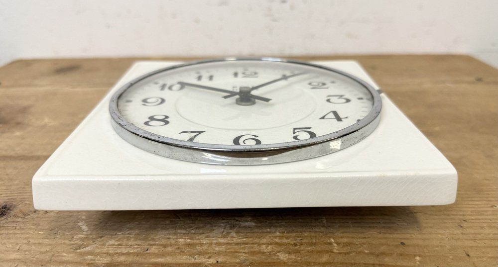 Vintage White Porcelain Wall Clock from Prim, 1970s for sale at Pamono