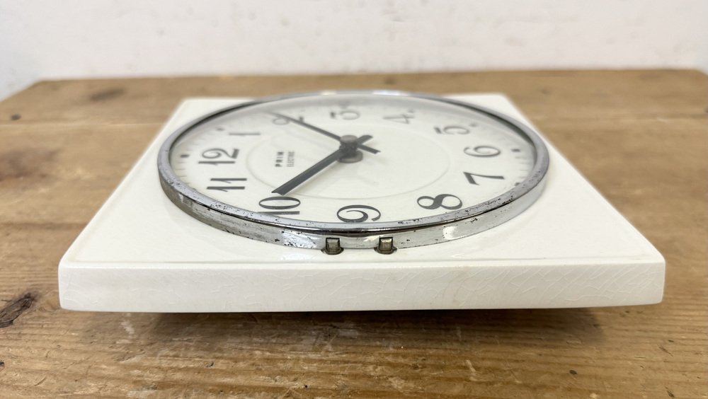 Vintage White Porcelain Wall Clock from Prim, 1970s for sale at Pamono