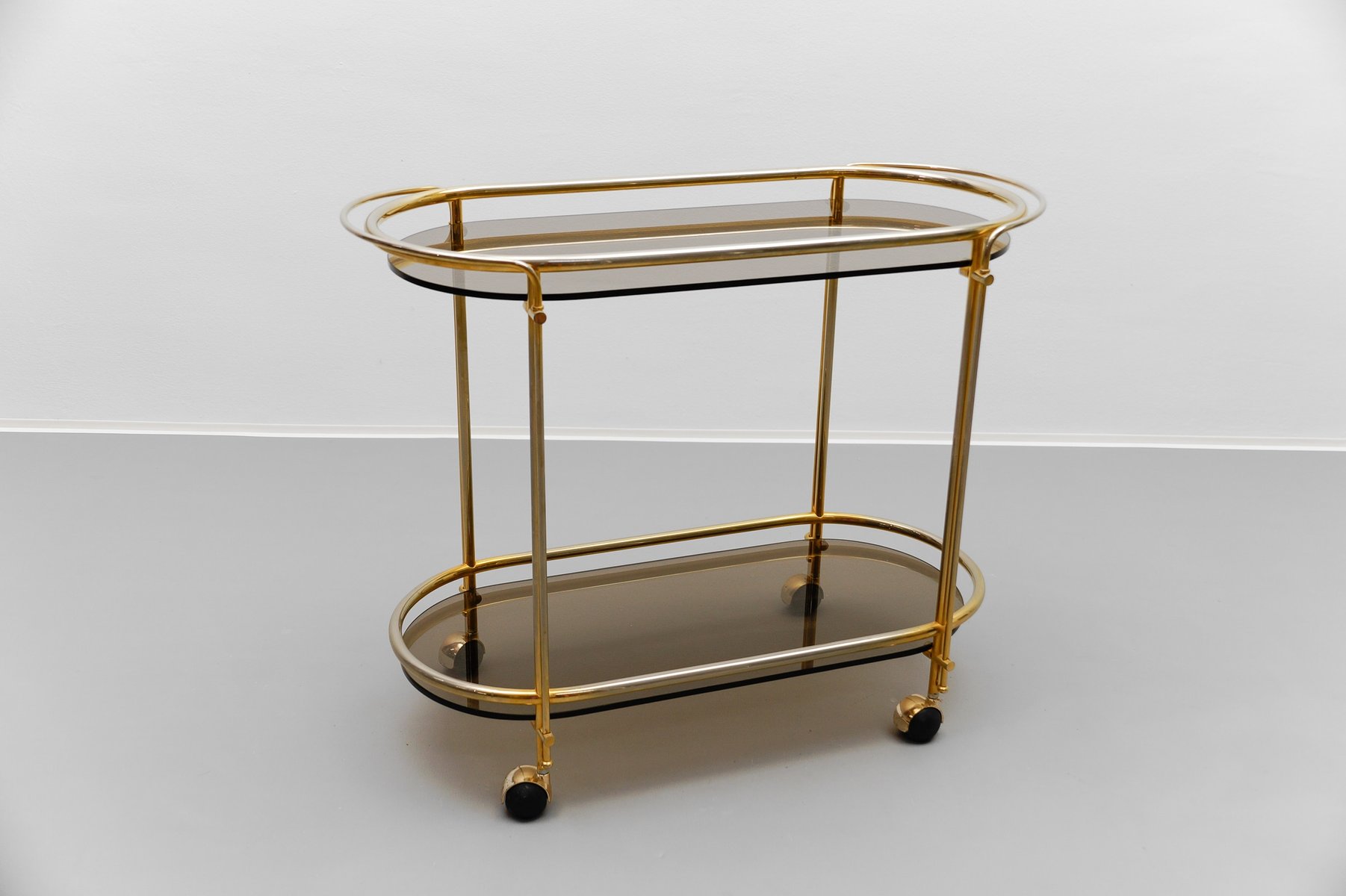Italian Brass & Smoked Glass Serving Bar Cart, 1950s for sale at Pamono