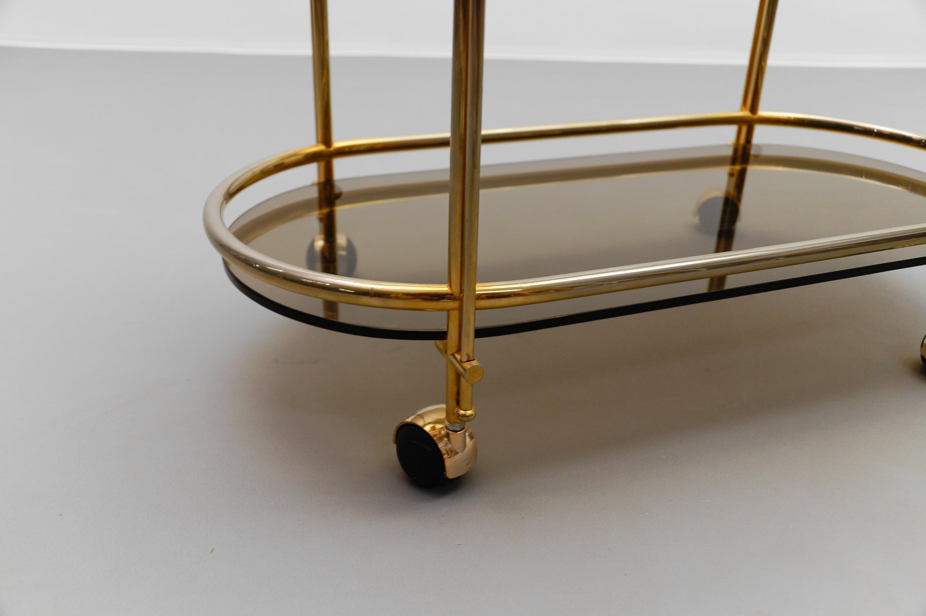 Italian Brass & Smoked Glass Serving Bar Cart, 1950s for sale at Pamono