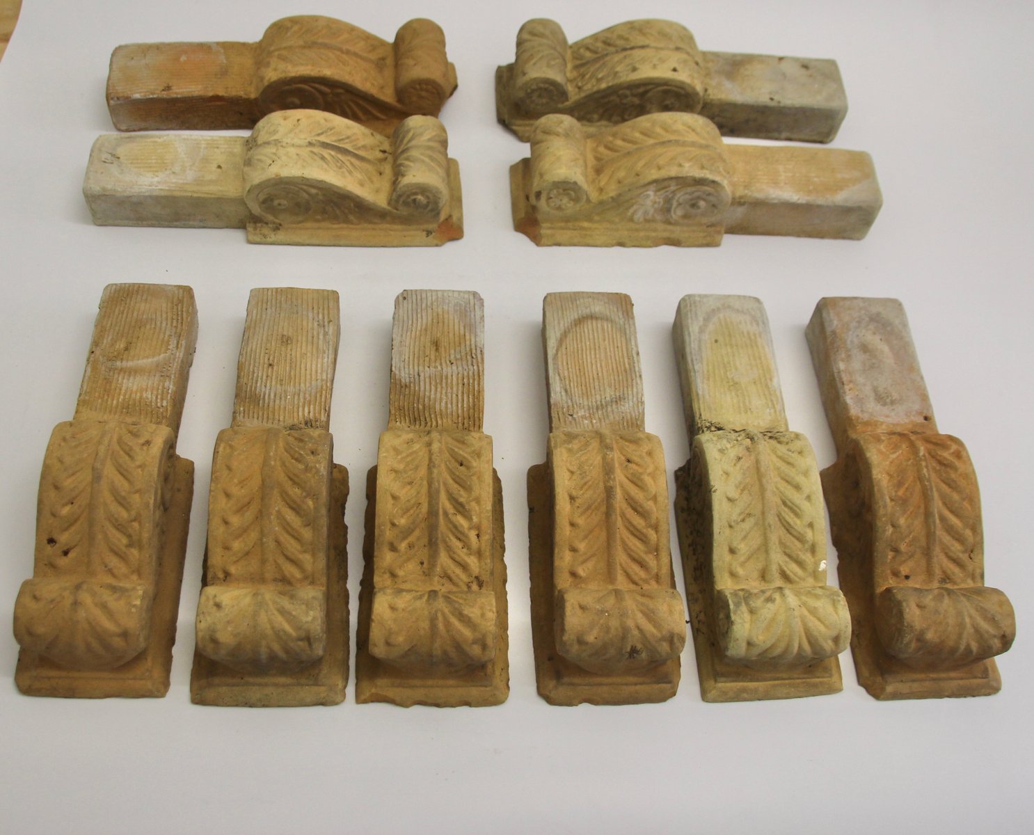 Terracotta Plant Pot Feet, 1920s, Set of 10 for sale at Pamono