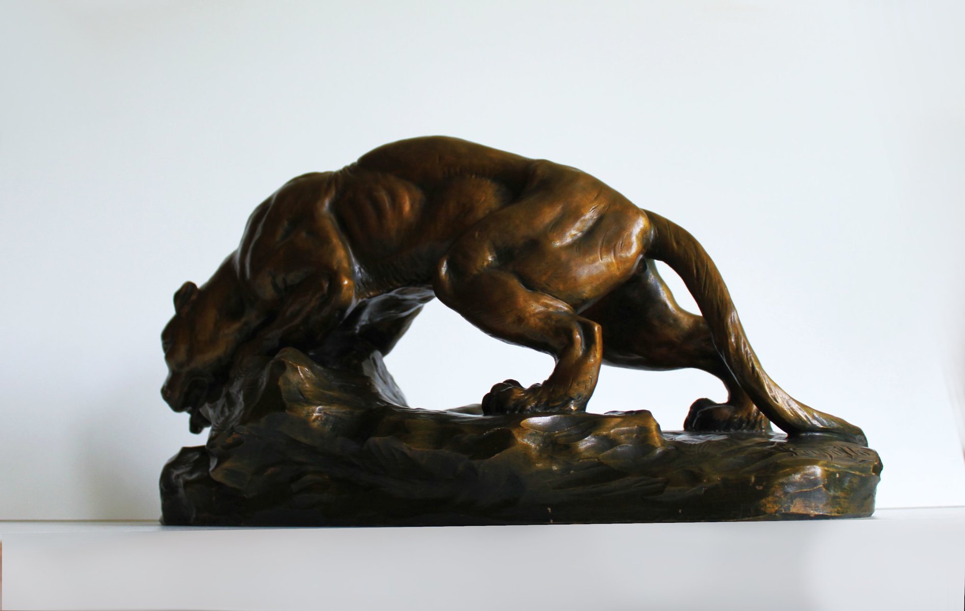 Sculpture of a Terracotta Lioness by Armand Fagotto, 20th Century for sale at Pamono