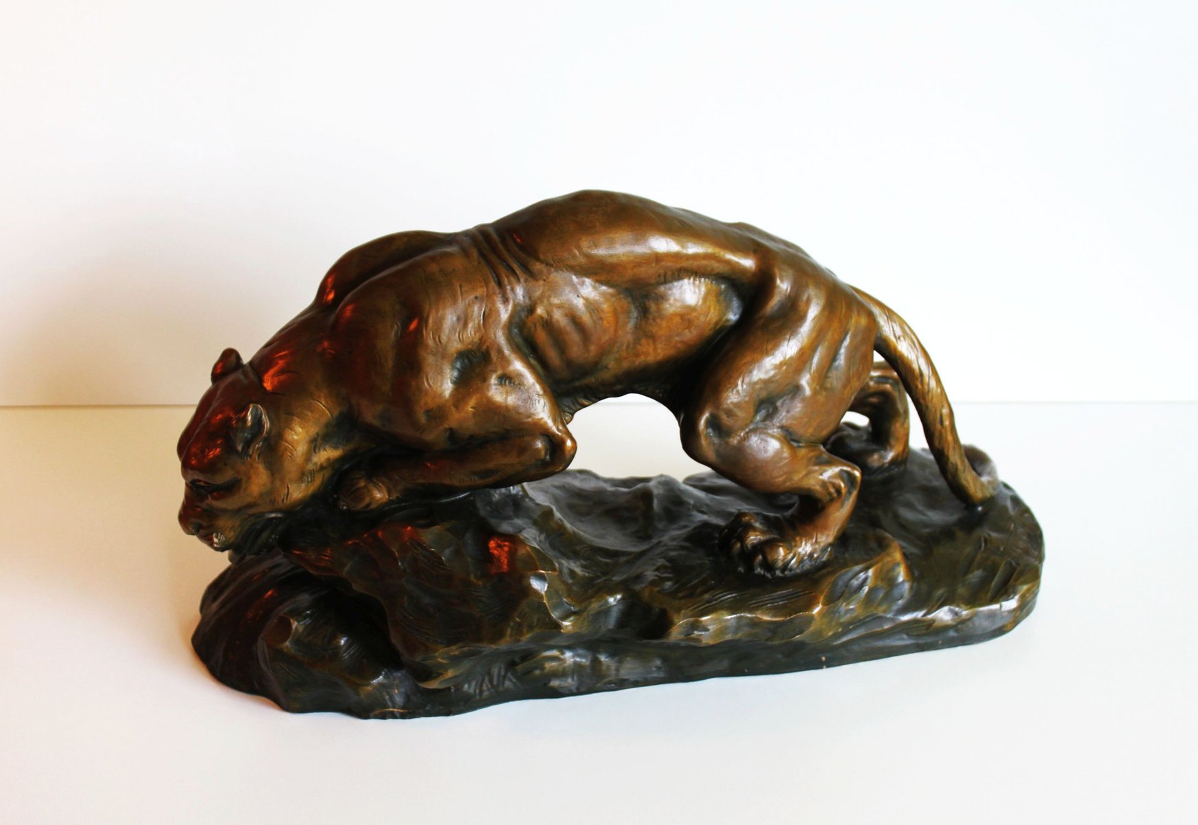Sculpture of a Terracotta Lioness by Armand Fagotto, 20th Century for sale at Pamono