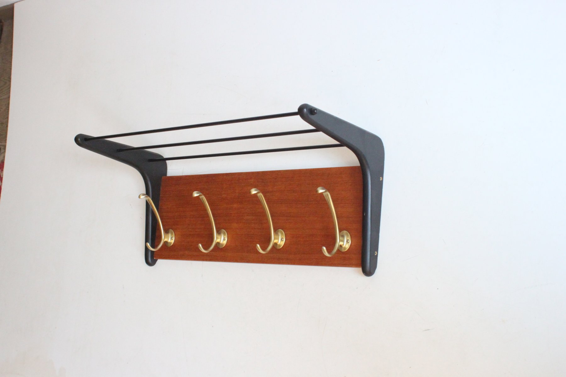 Brass and Teak Boomerang Coat Rack attributed to Alfred Hendrickx for ...