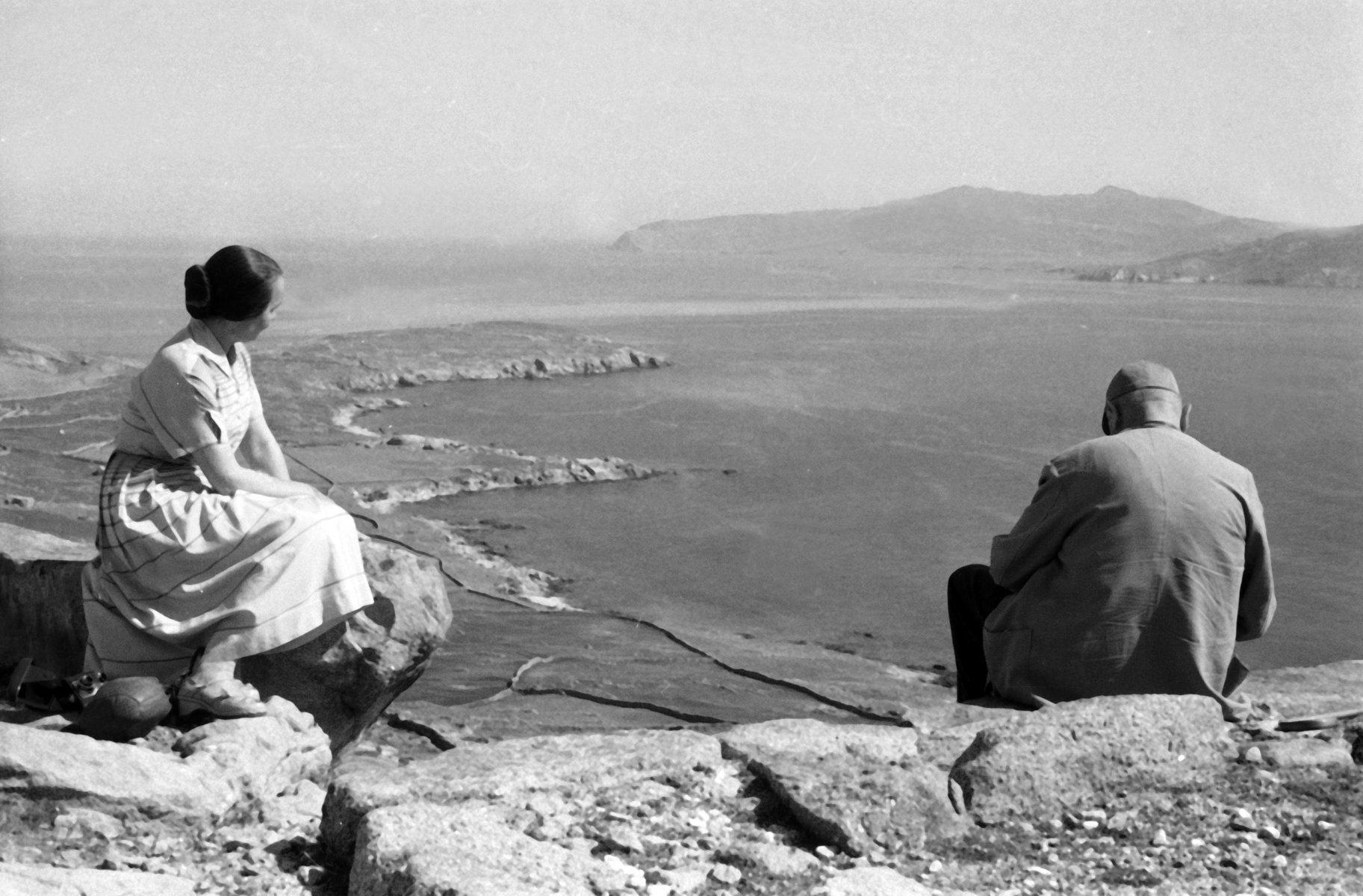 Erich Andres, Man and Woman Sitting on a Cliff at the Island of Delos ...