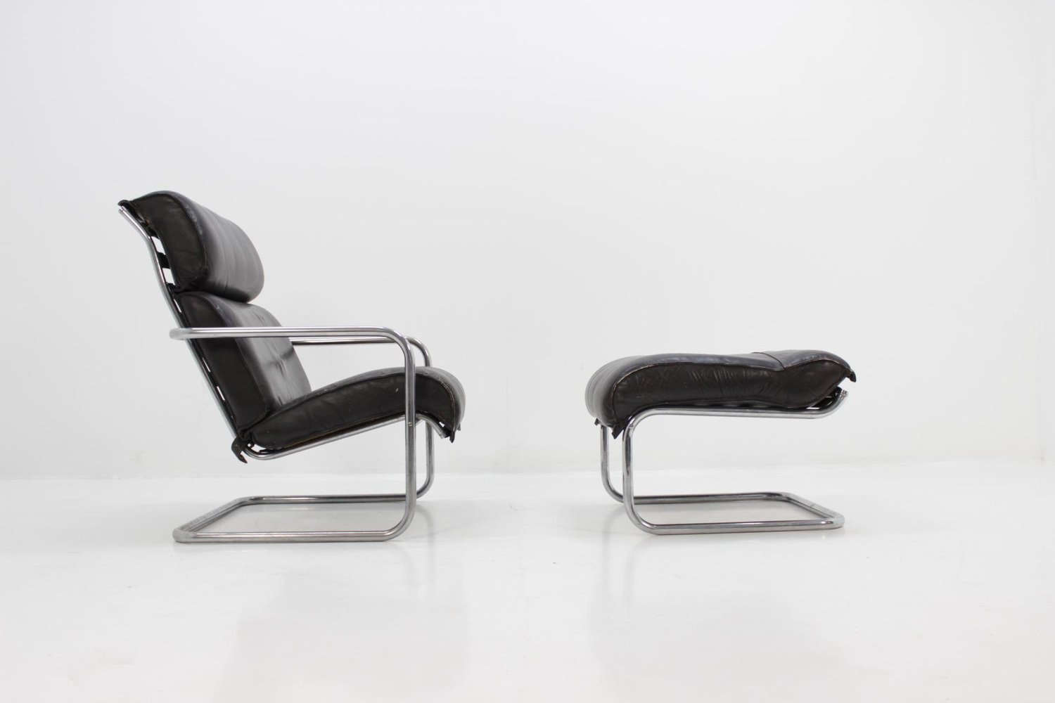 Set of Chrome Tubular Leather Lounge Chair and Footstool, 1950s for ...