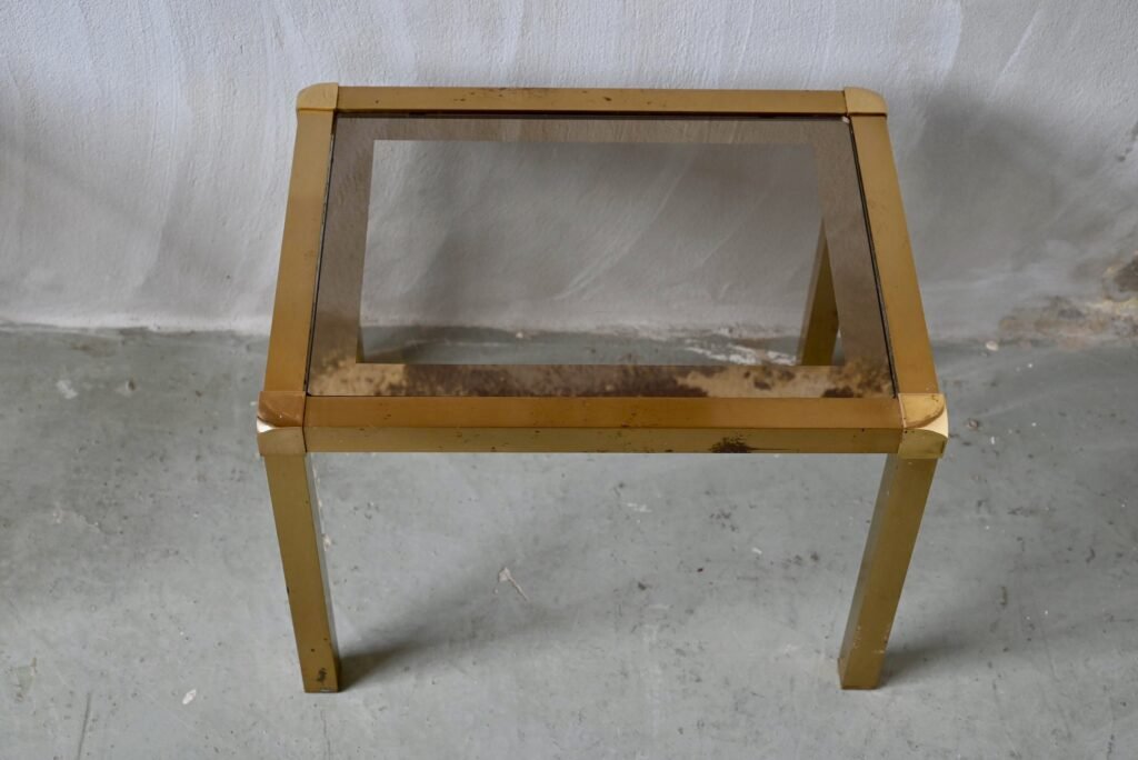 Hollywood Regency Style Nesting Tables or Flying Tables in Gold Metal and Smoked Glass, 1970s ...