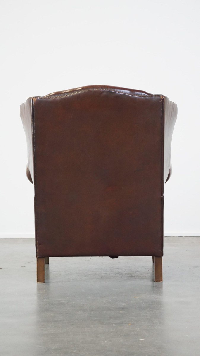 Leather Cognac Wing Chair for sale at Pamono