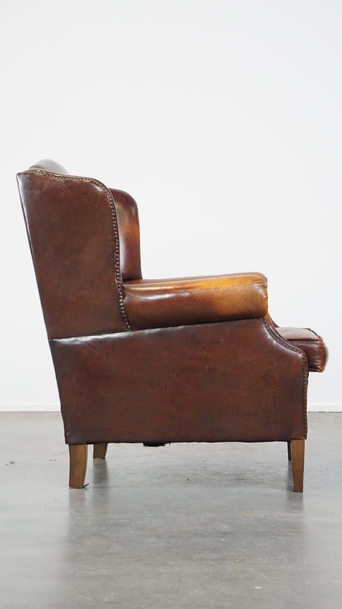 Leather Cognac Wing Chair for sale at Pamono