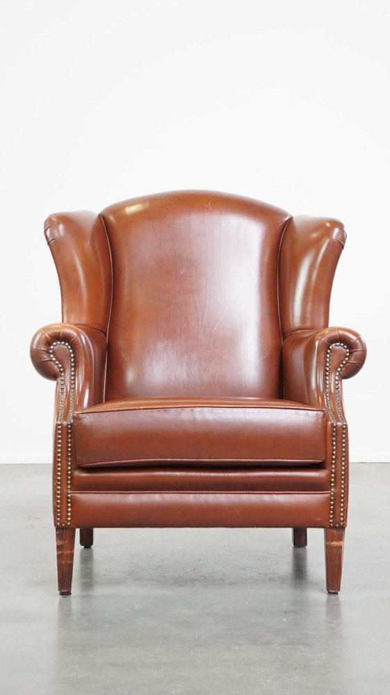 English Cognac Leather Wing Chair for sale at Pamono