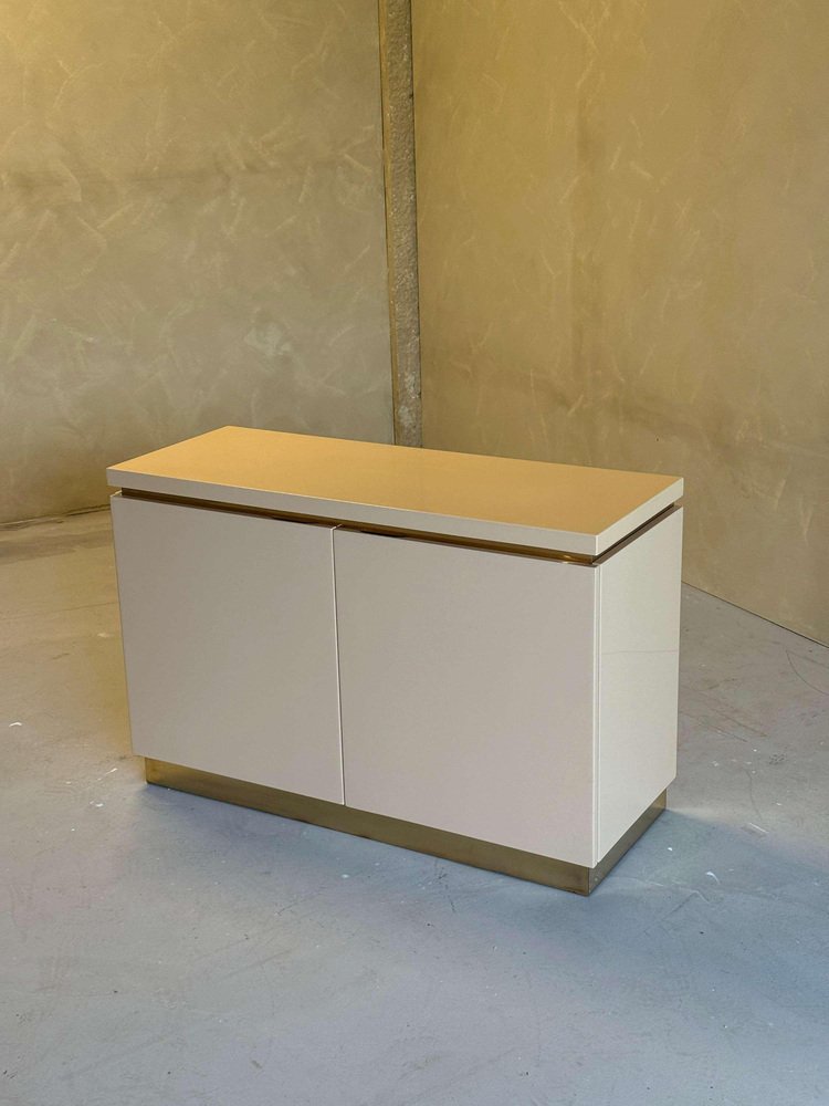 Small Cream Lacquered and Brass Cabinet by Jean Claude Mahey, 1970s for sale at Pamono