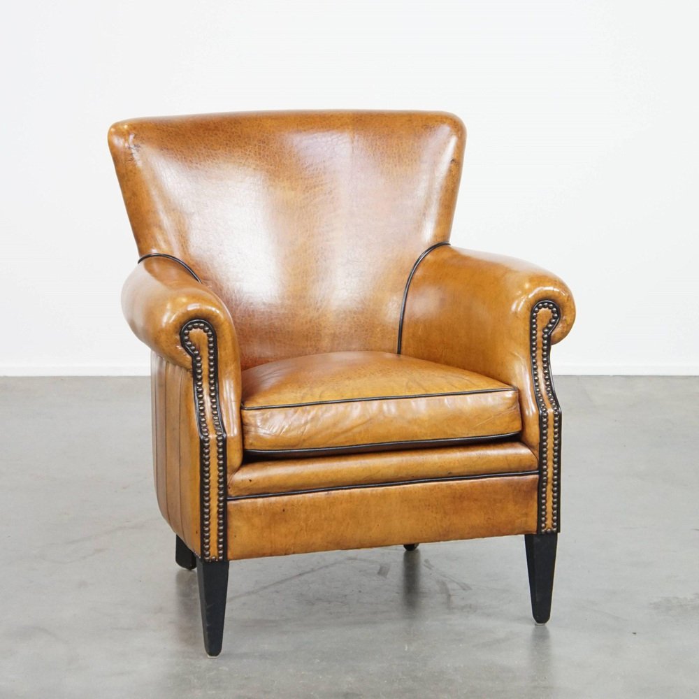 Leather Armchair in a Light Cognac Color for sale at Pamono