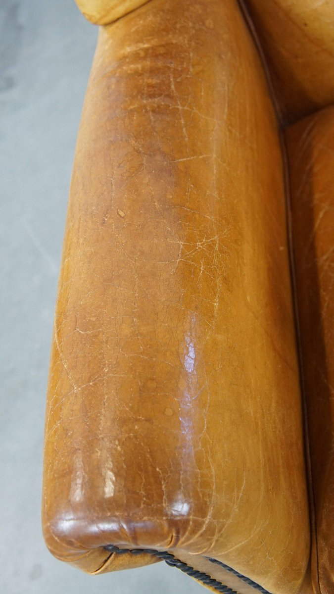 Vintage English Light-Colored Leather Wing Chair for sale at Pamono